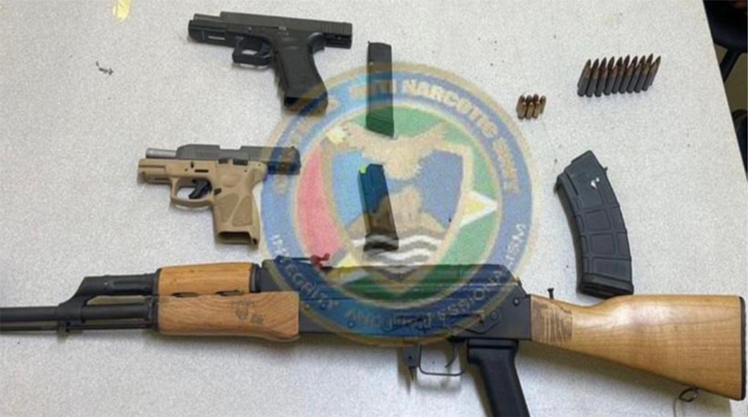AK-47, pistols, ammo seized in Sheriff St. bust - Kaieteur News